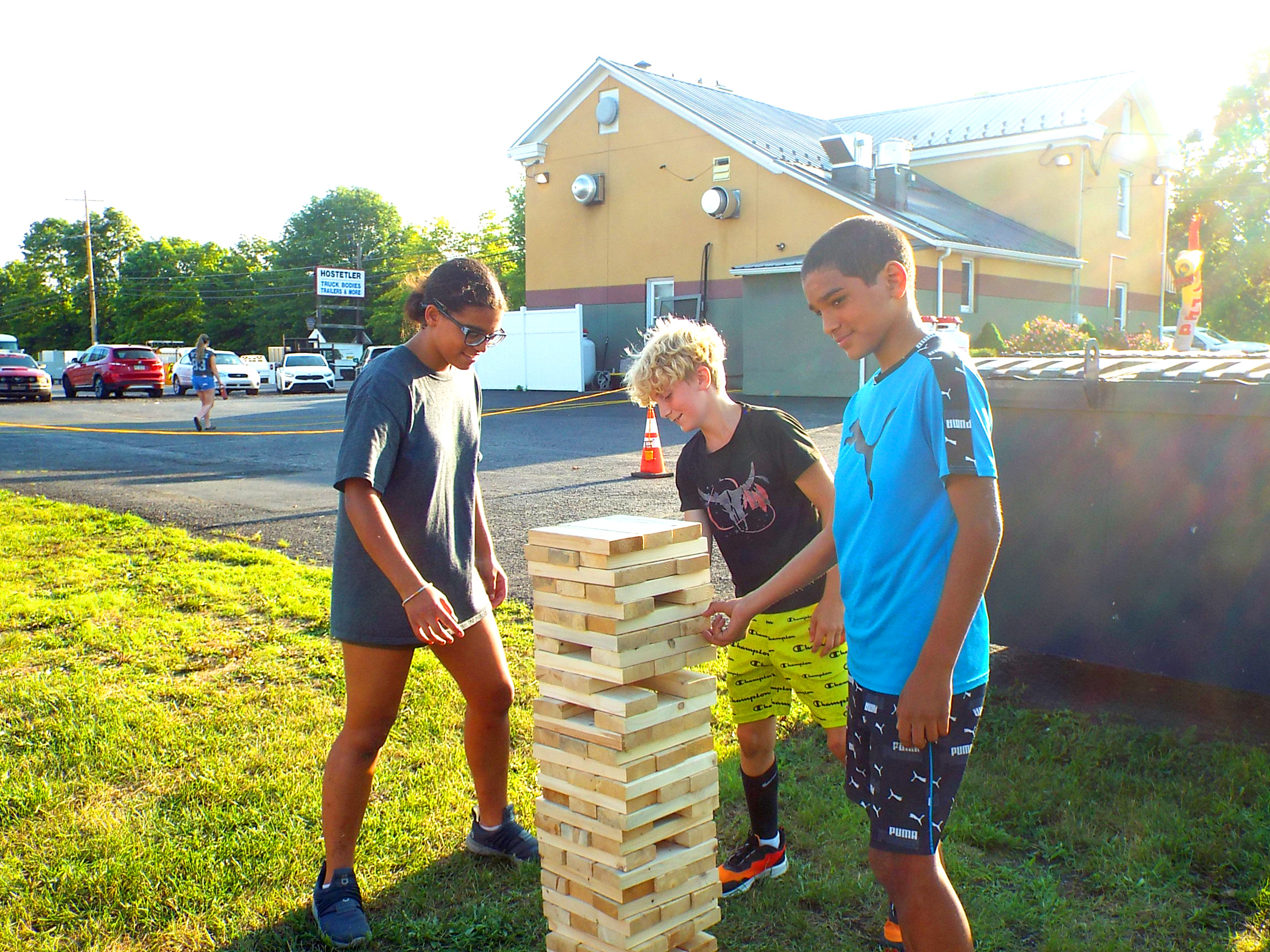 Jasmine Russell, Michael Vodopij, and Ja-quan Russell compete in giant ...